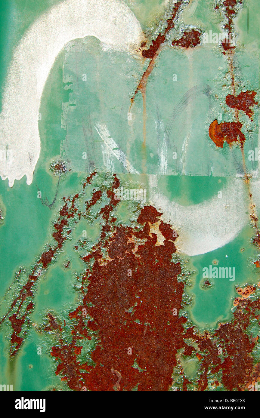 Rusty metal texture with peeling paint and graffiti. Abstract ...