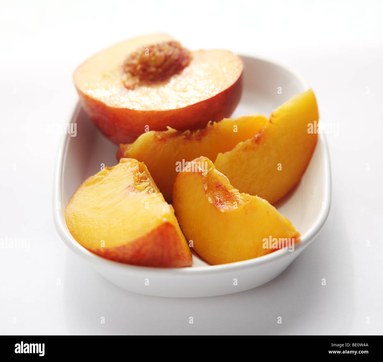 Ripe juicy slices peach hi-res stock photography and images - Alamy