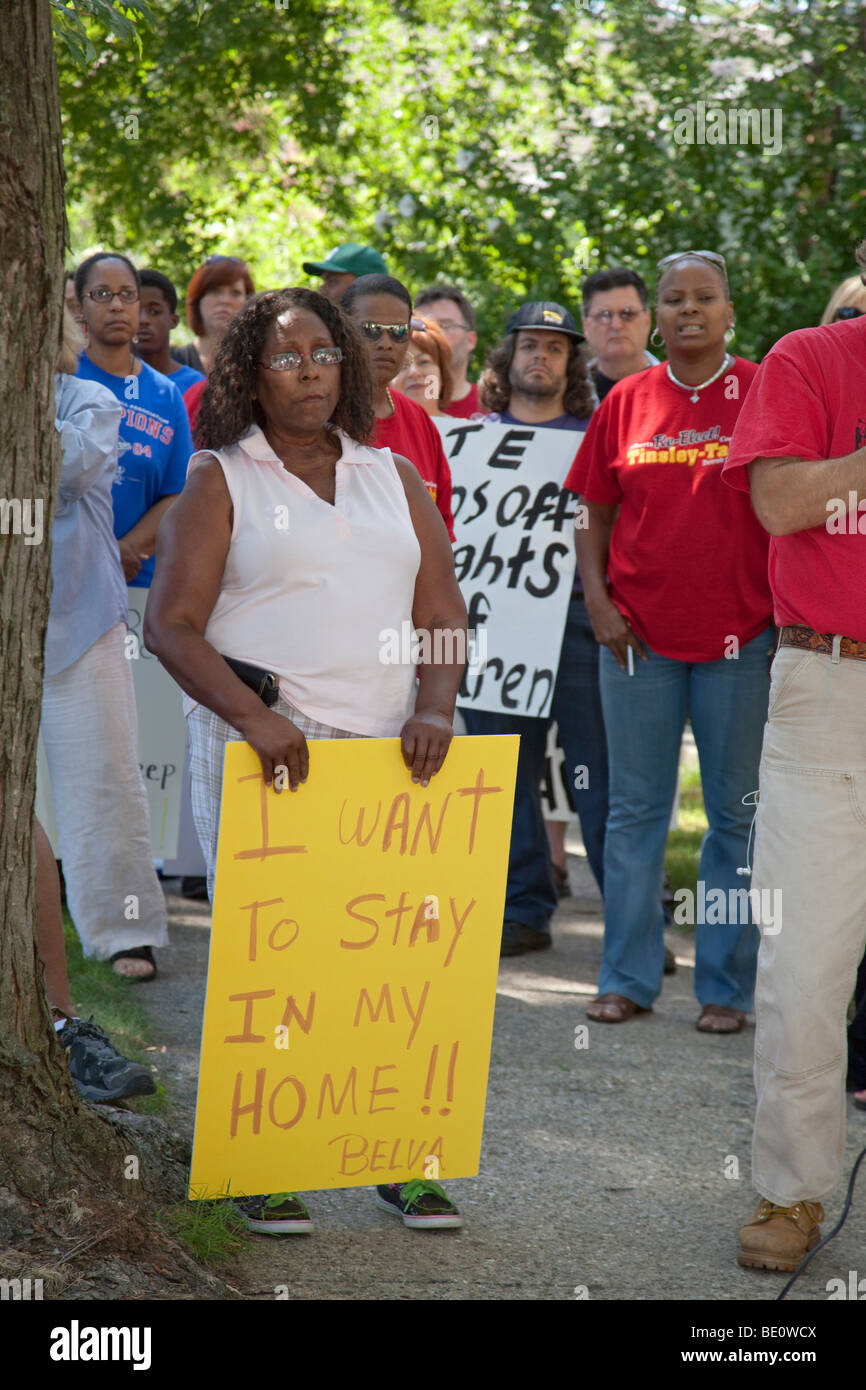 Protest against home foreclosure in middle class neighborhood of ...