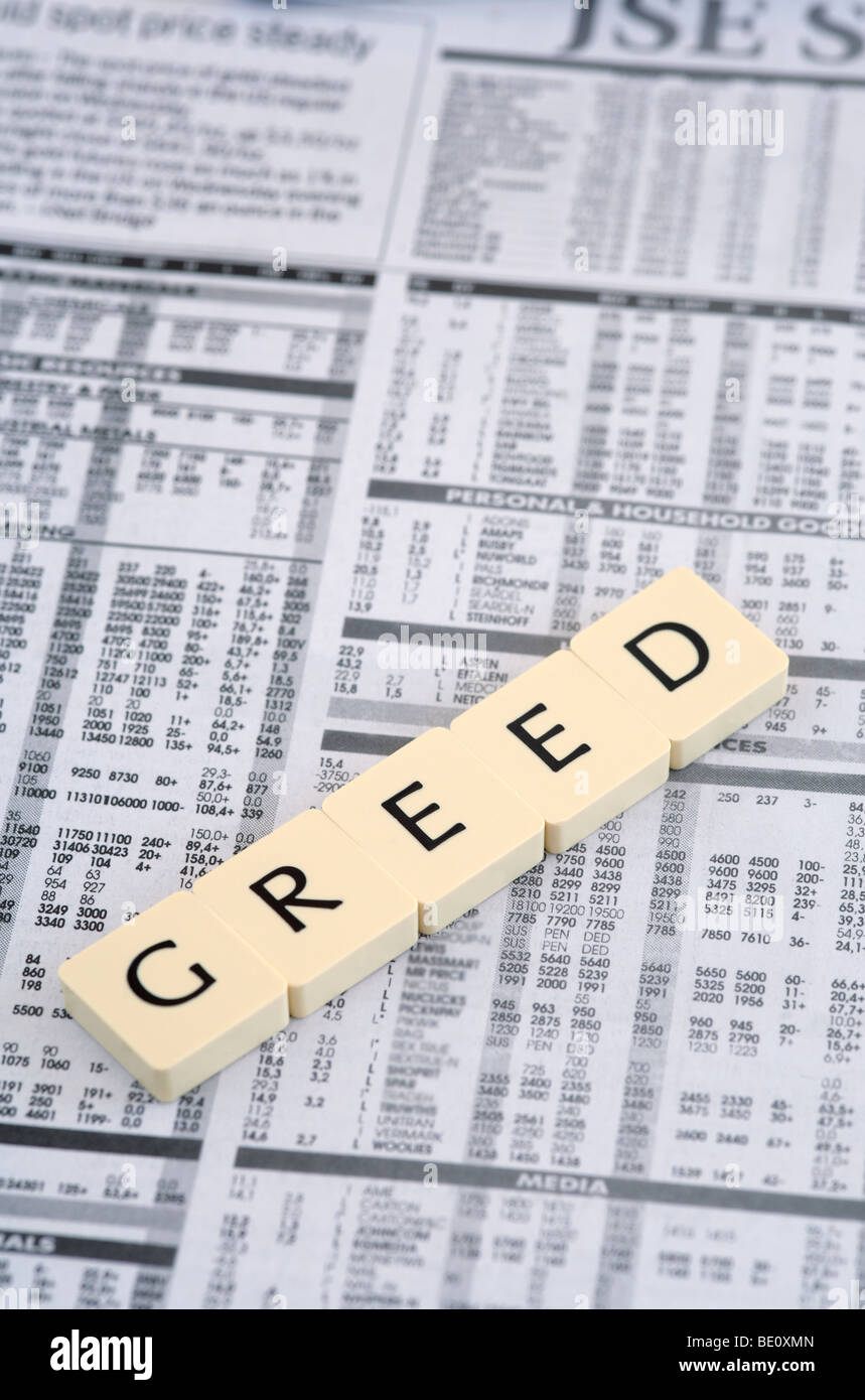 Word tiles spelling Greed Stock Photo - Alamy