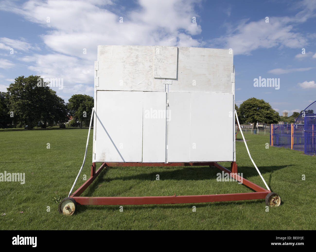 a sightscreen on a cricket pitch in a park Stock Photo - Alamy