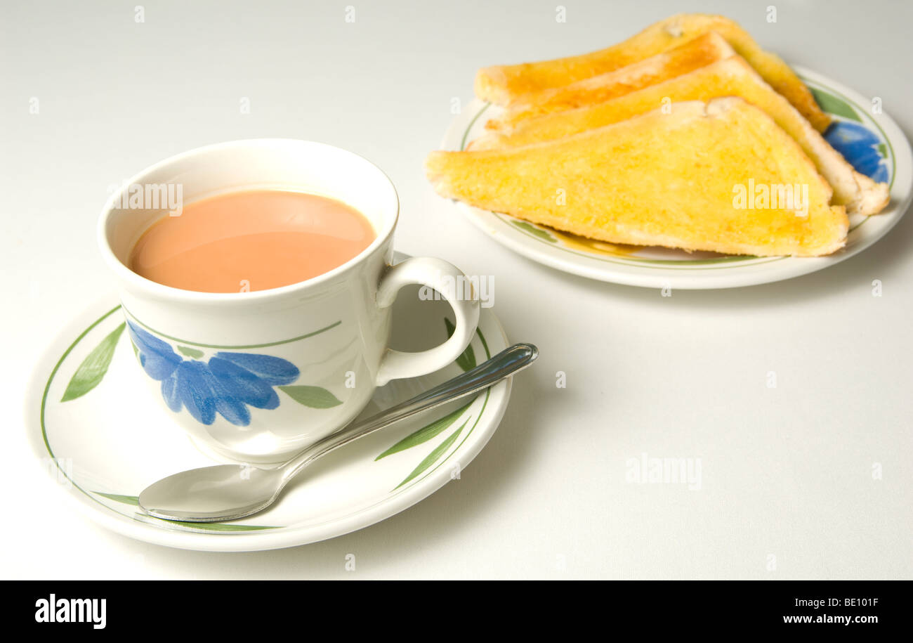Cup of tea and buttered toast Stock Photo - Alamy