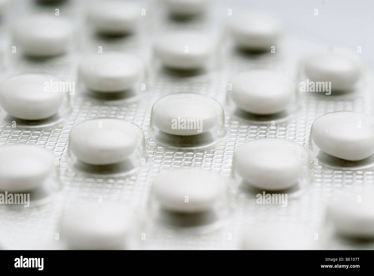 white coated tablets in blister packaging Stock Photo - Alamy