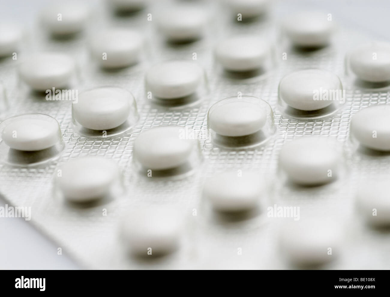 white coated tablets in blister packaging Stock Photo - Alamy