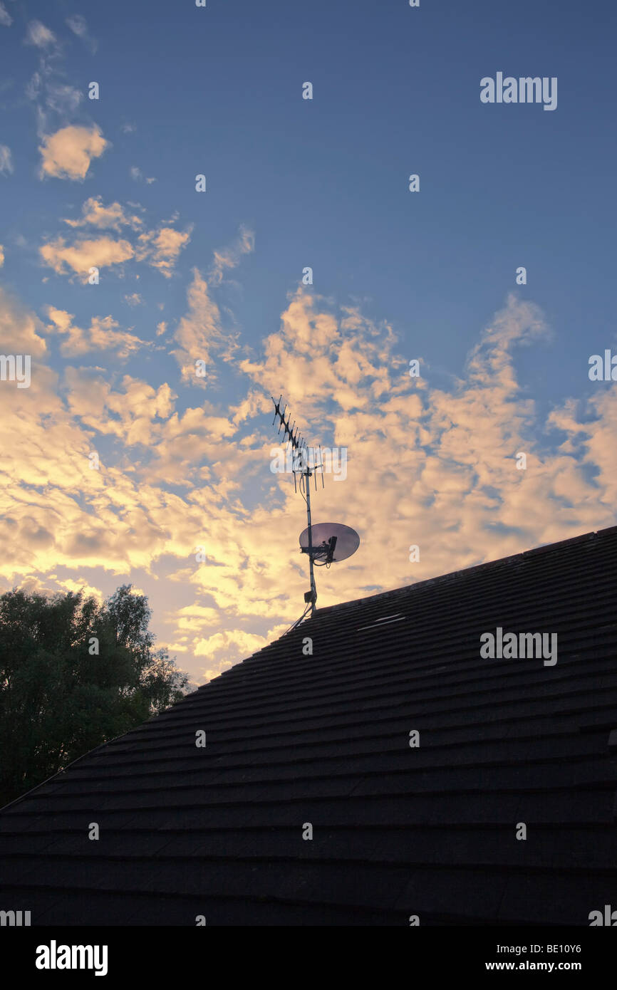 A satellite digital television arial on a roof Stock Photo - Alamy