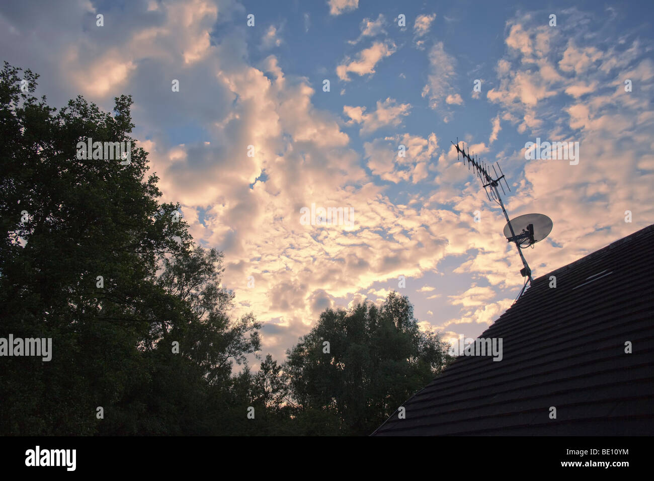 A satellite digital television arial on a roof Stock Photo - Alamy