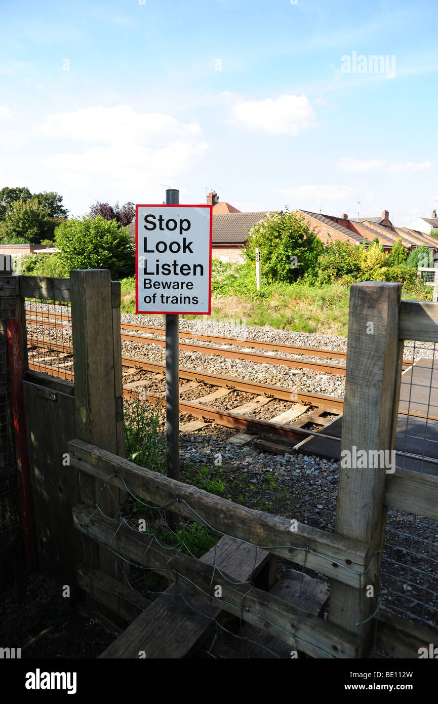 Railway level foot crossing Stock Photo - Alamy