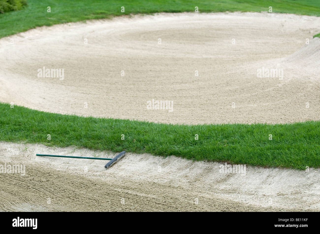 Sand traps of a golf course Stock Photo - Alamy