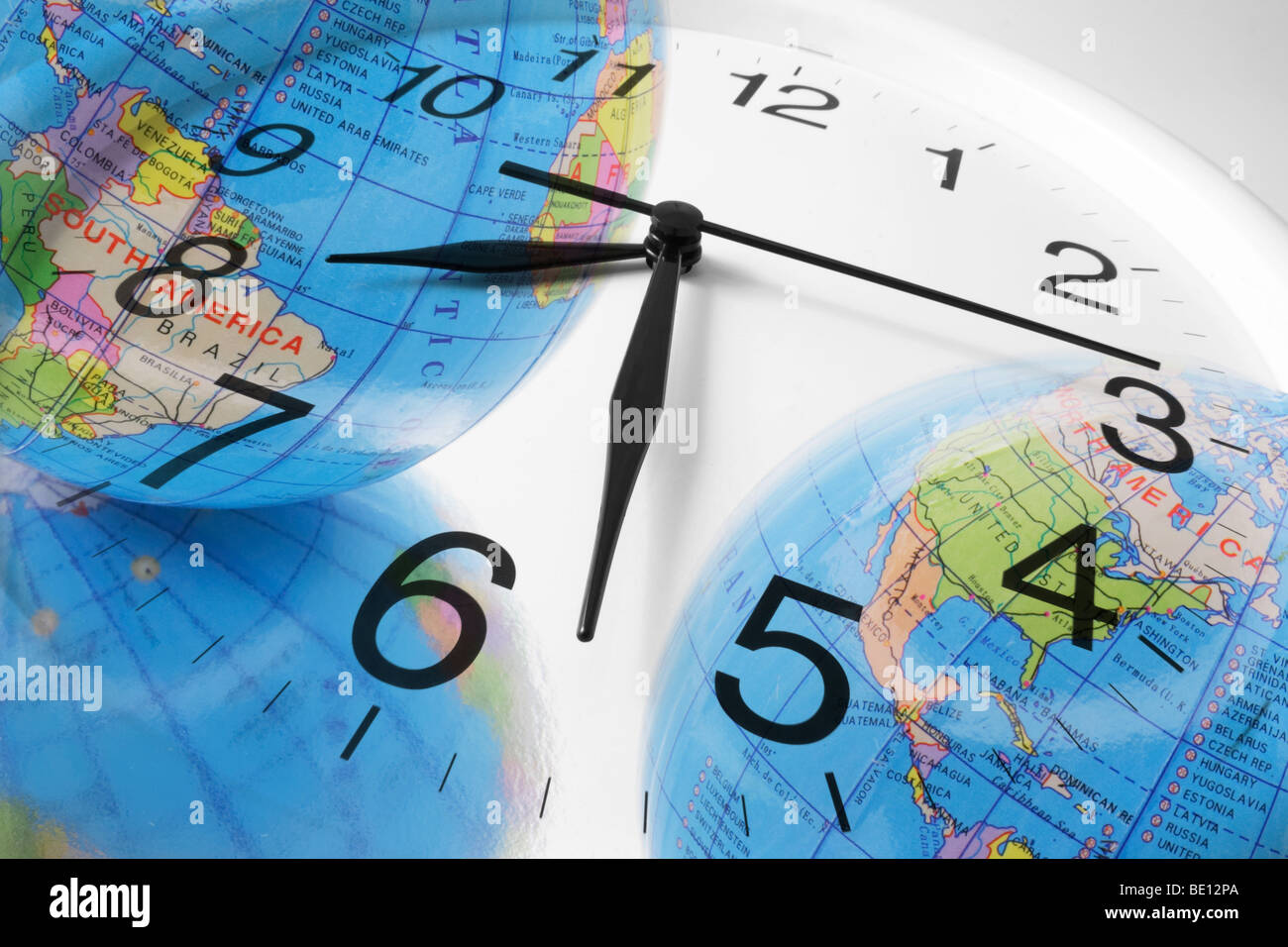 Clock and Globes Stock Photo - Alamy