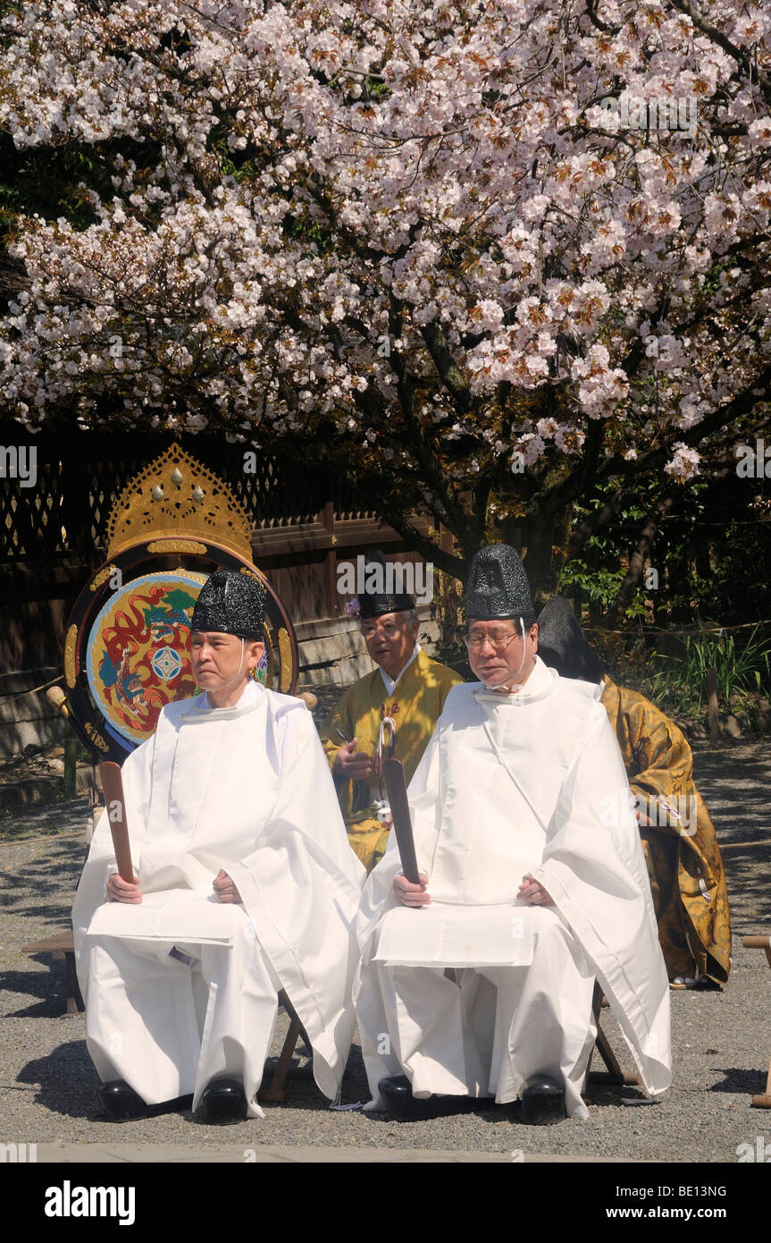 Shinto priests are sitting in devotion, shrine festival during the ...