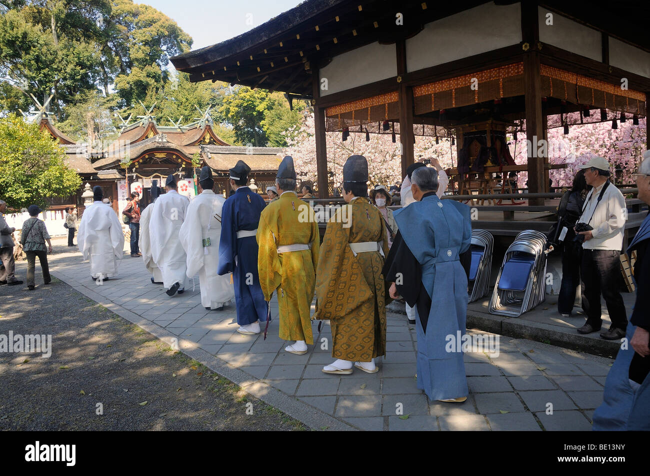 Shinto priests proceed to worship, shrine festival during the cherry ...