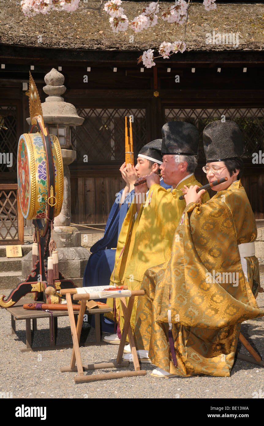 Musicians at the Aoi festival with wooden mouth organ, Sho, Ryuteki ...