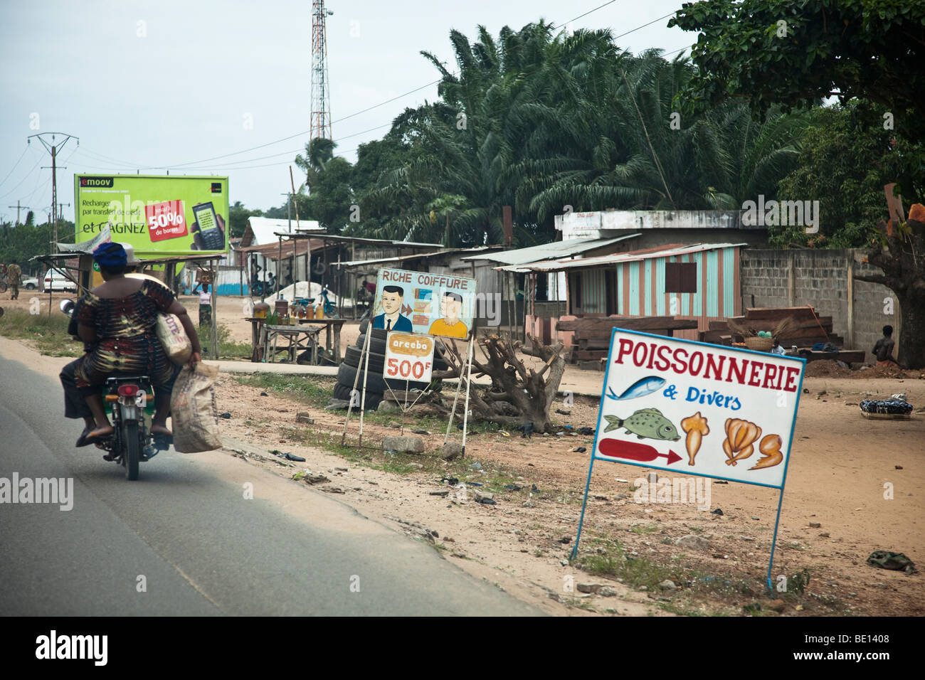 Signs line the streets of Cotonou, Benin.Due to high illiteracy rates ...