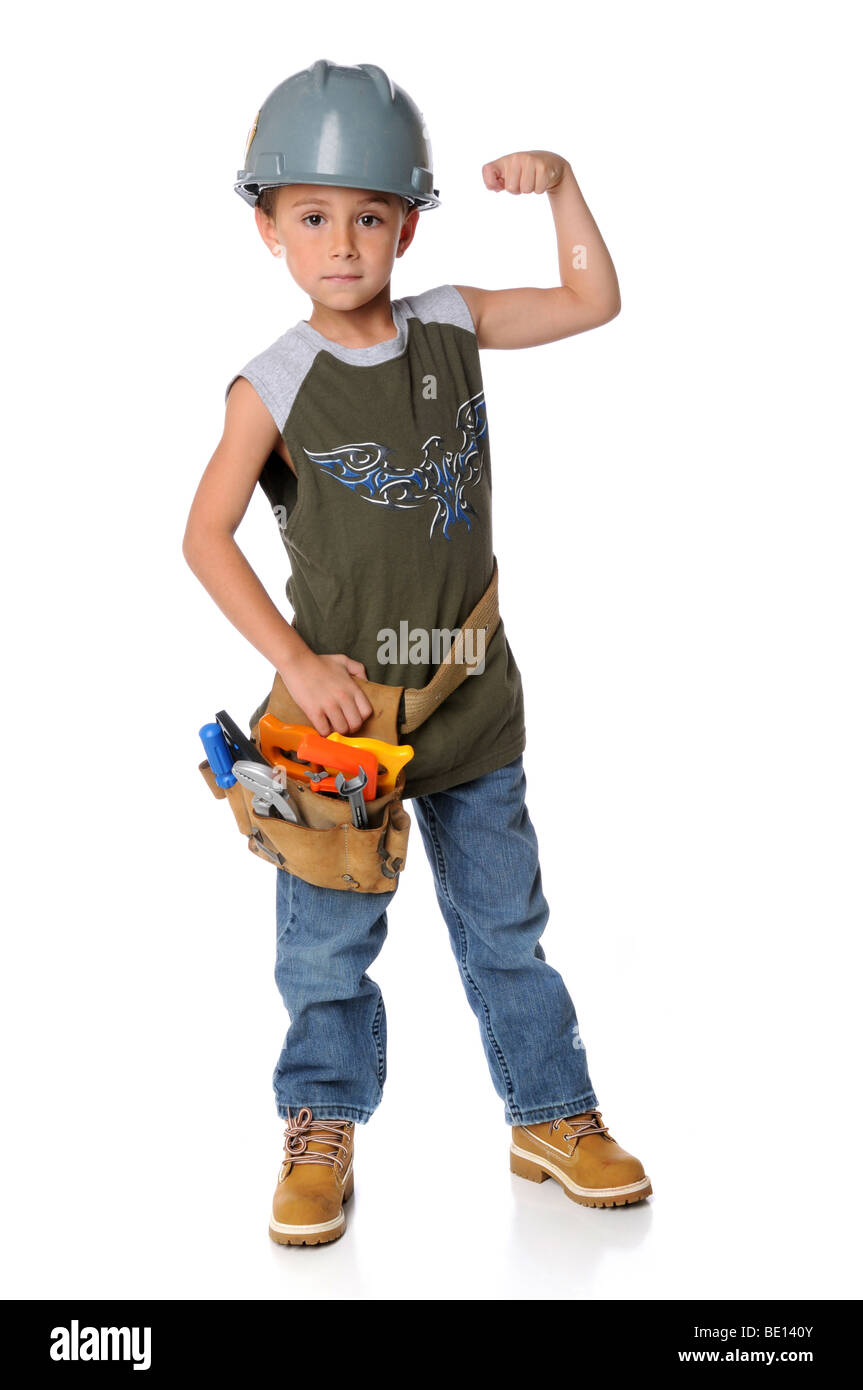 Young boy dressed as construction worker isolated over a white ...