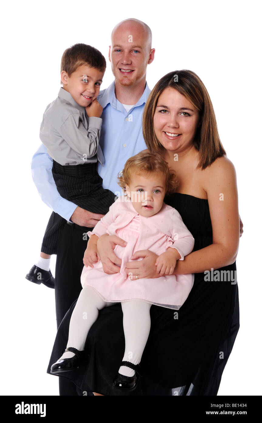Family of four posing isolated over a white background Stock Photo - Alamy