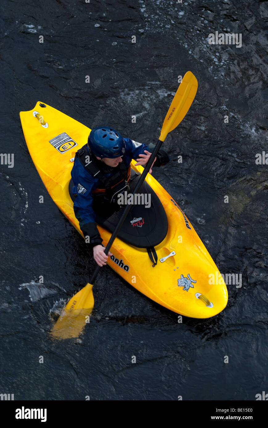 male in yellow canoe kayak from above on water Stock Photo - Alamy