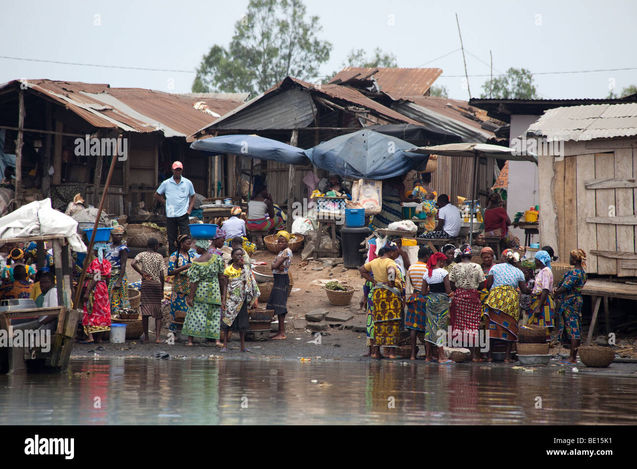 Women haggle over prices at Dantokpa Market in Benin's capital city of ...