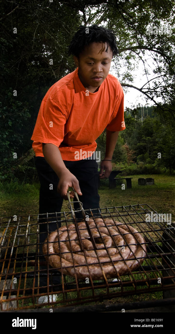 Man braaing boerewors sausage hi-res stock photography and images - Alamy