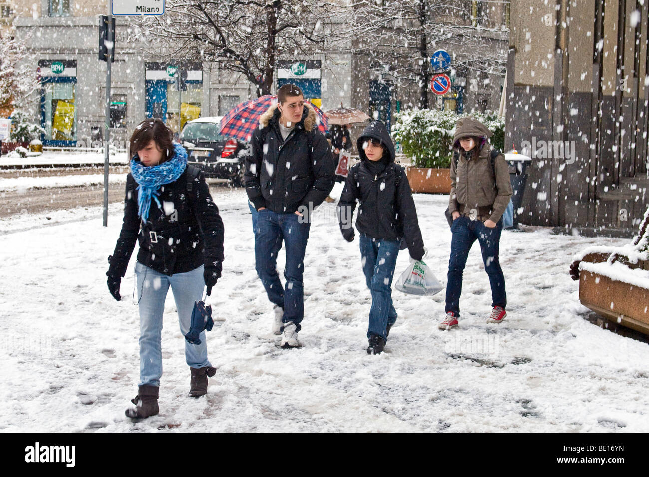 Young people, walk on the snow Stock Photo - Alamy