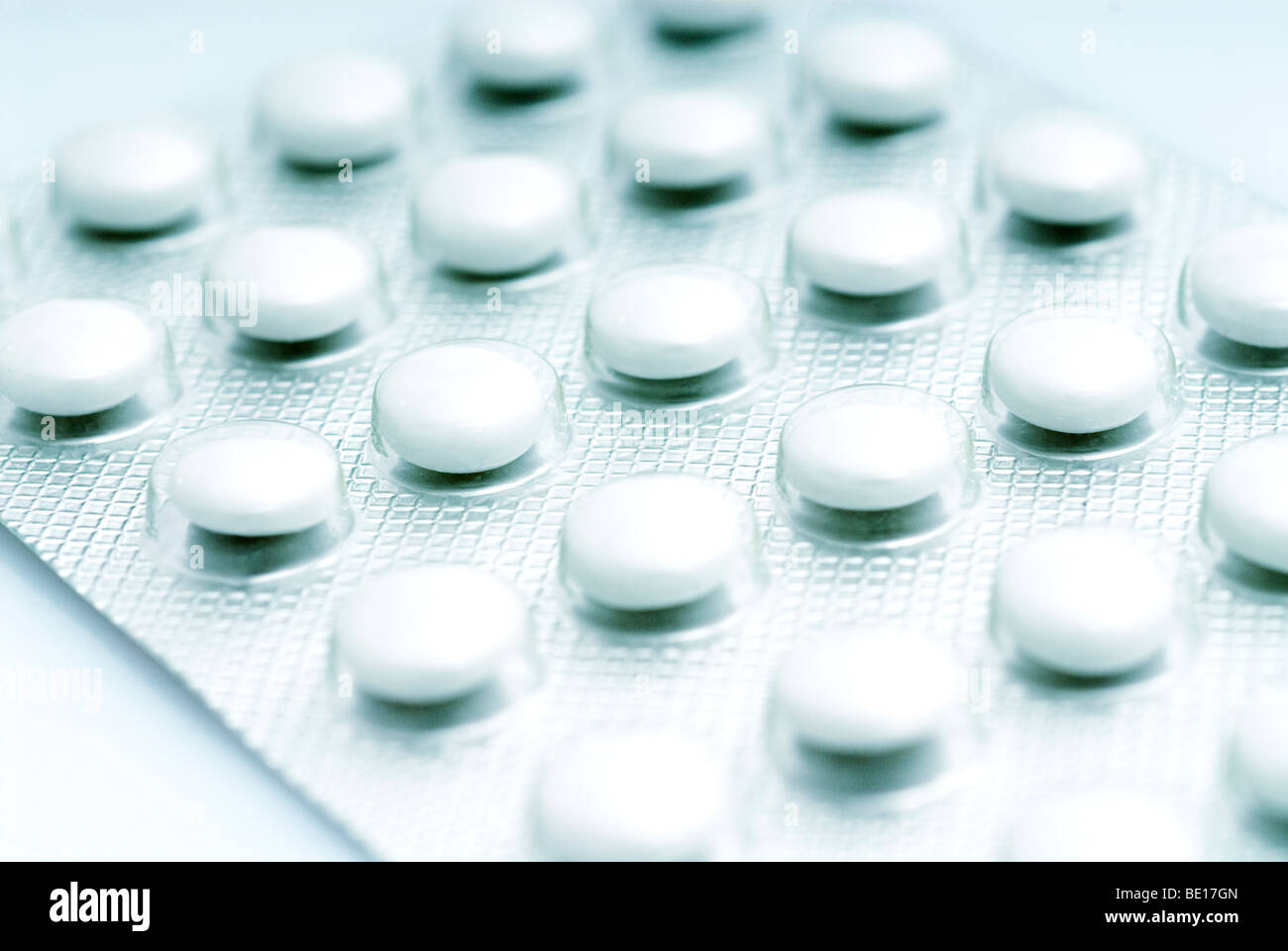 white coated tablets in blister packaging Stock Photo - Alamy