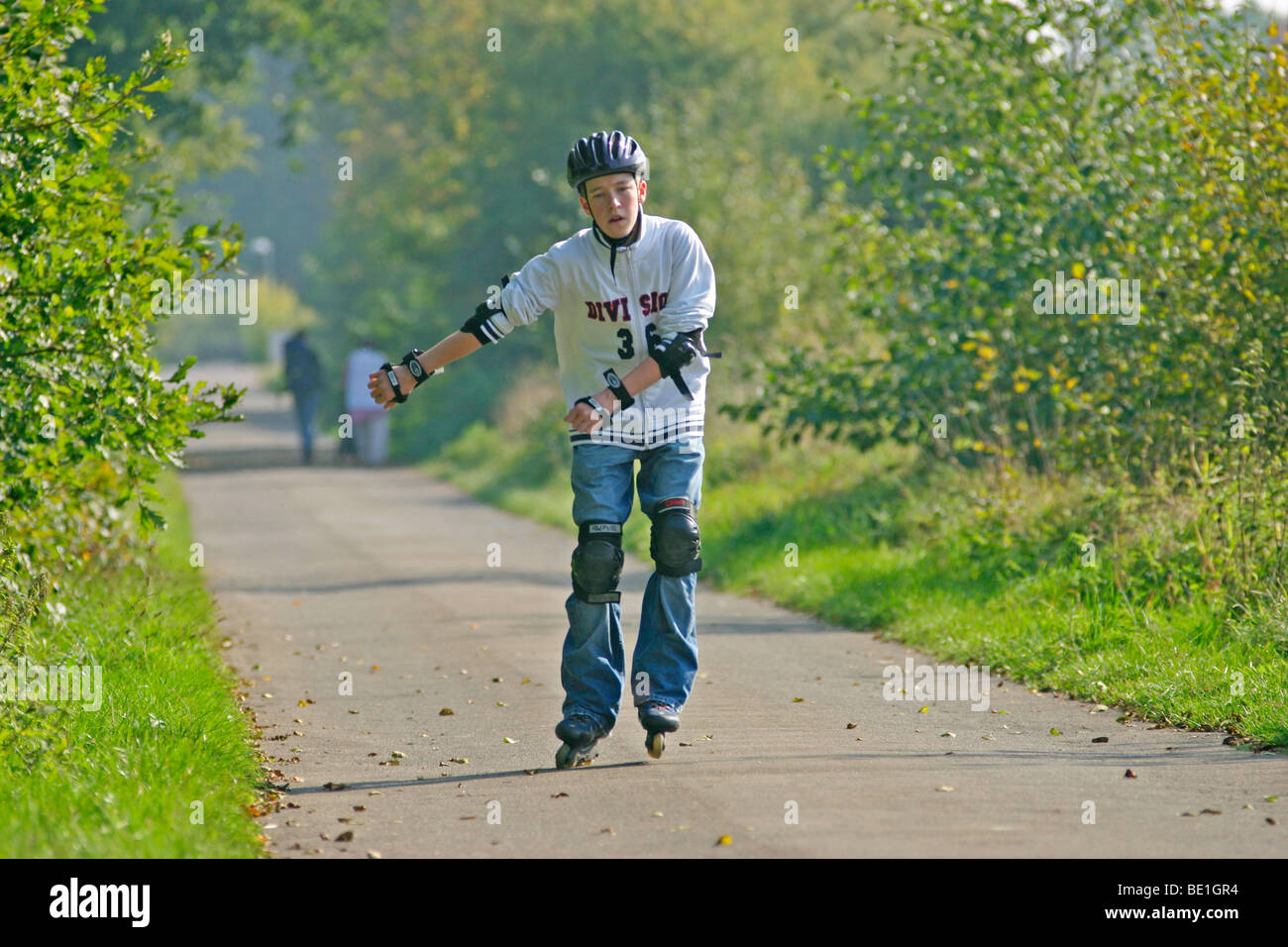 young boy inline-skating Stock Photo - Alamy