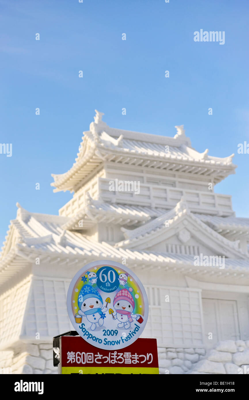A snow sculpture of a Japanese castle at the Sapporo Snow Festival ...