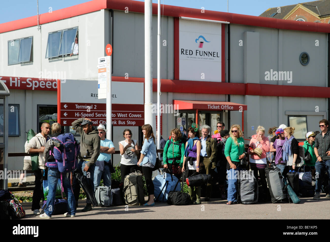 Crowded bus stop outside Red Funnel ferry terminal building Southampton ...