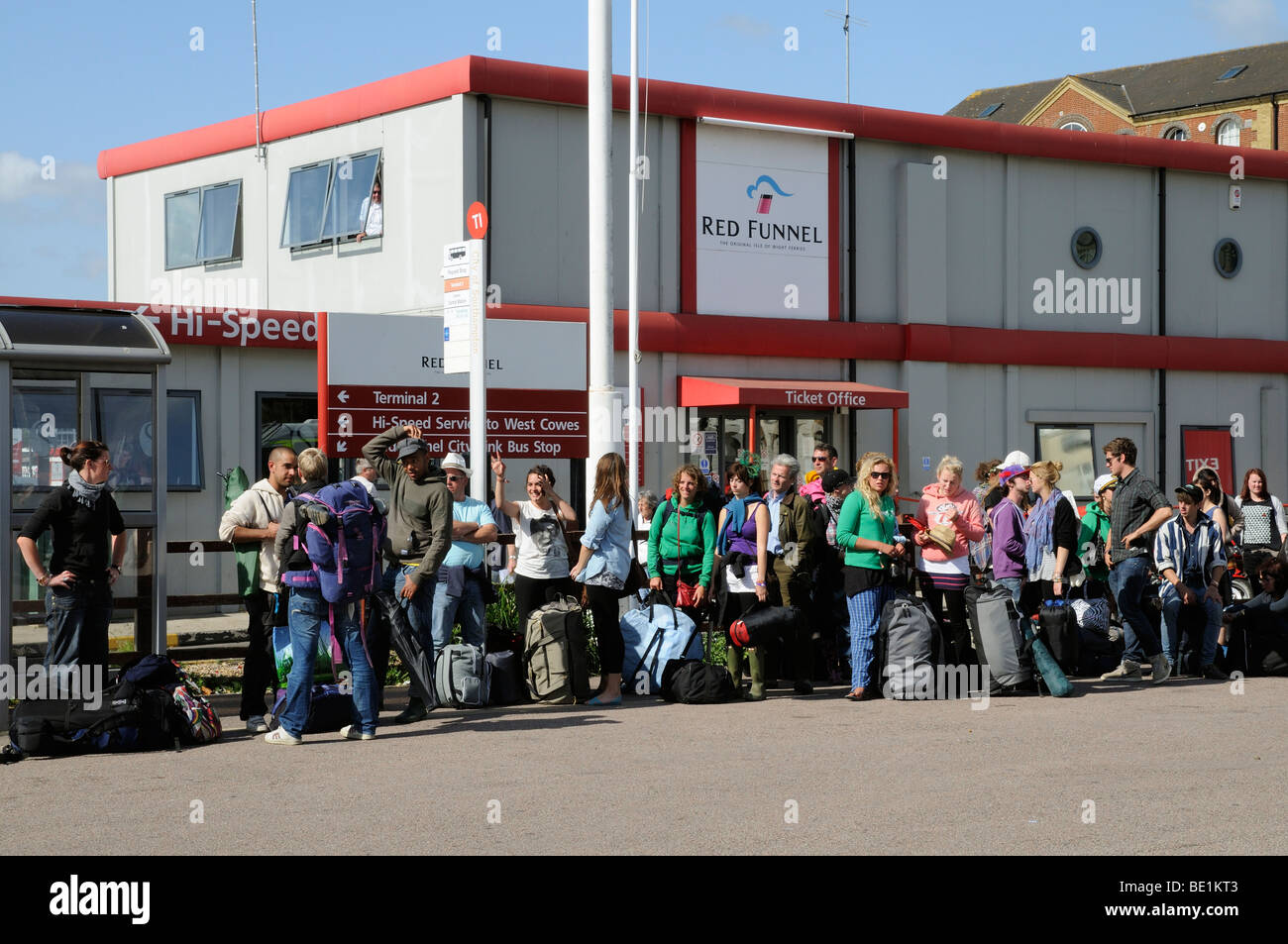 Crowded bus stop outside Red Funnel ferry terminal building Southampton ...
