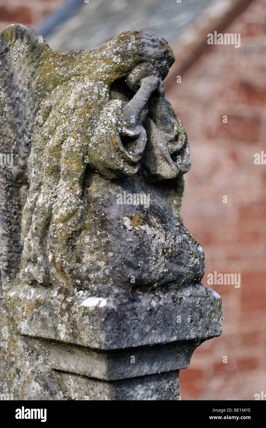Weeping female figure on gravestone. Church of Saint Michael and All ...