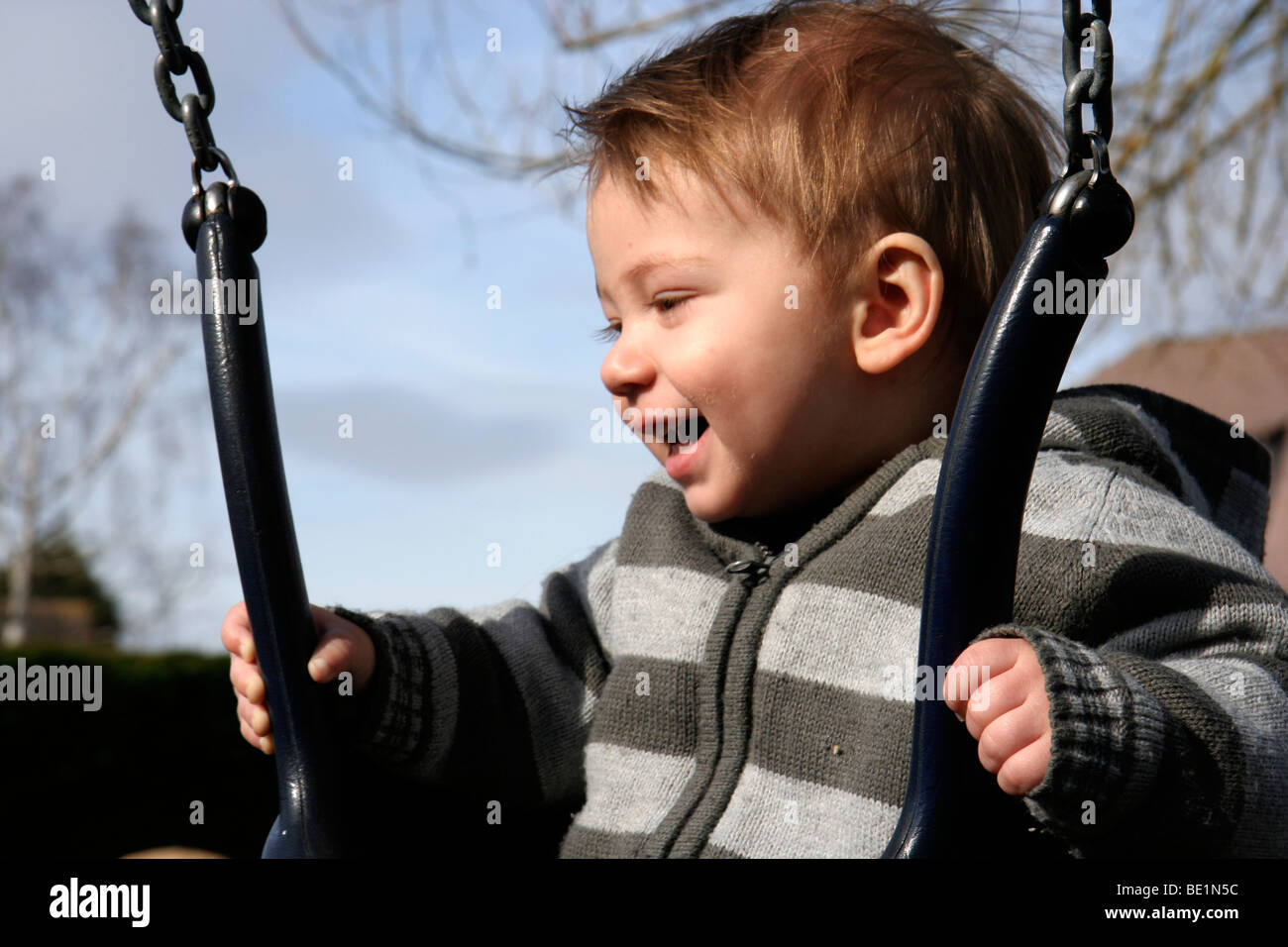 Old swing at playground hi-res stock photography and images - Alamy