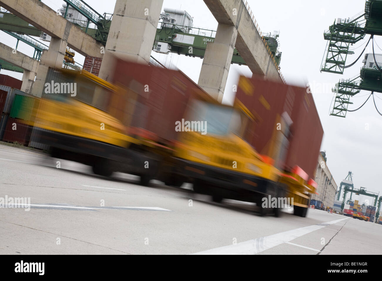 Container truck teu teus blurred moving box boxes Stock Photo - Alamy