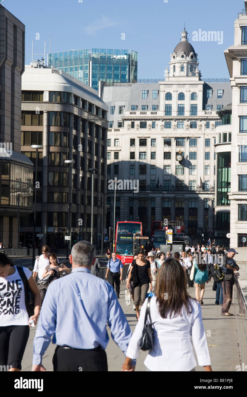 Commuters crossing London Bridge London England Stock Photo - Alamy