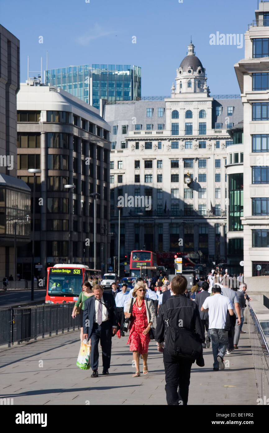 Commuters crossing London Bridge London England Stock Photo - Alamy