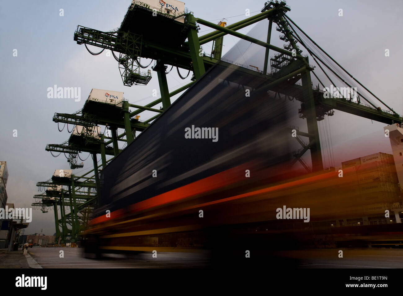 Container truck teu teus blurred moving box boxes Stock Photo - Alamy