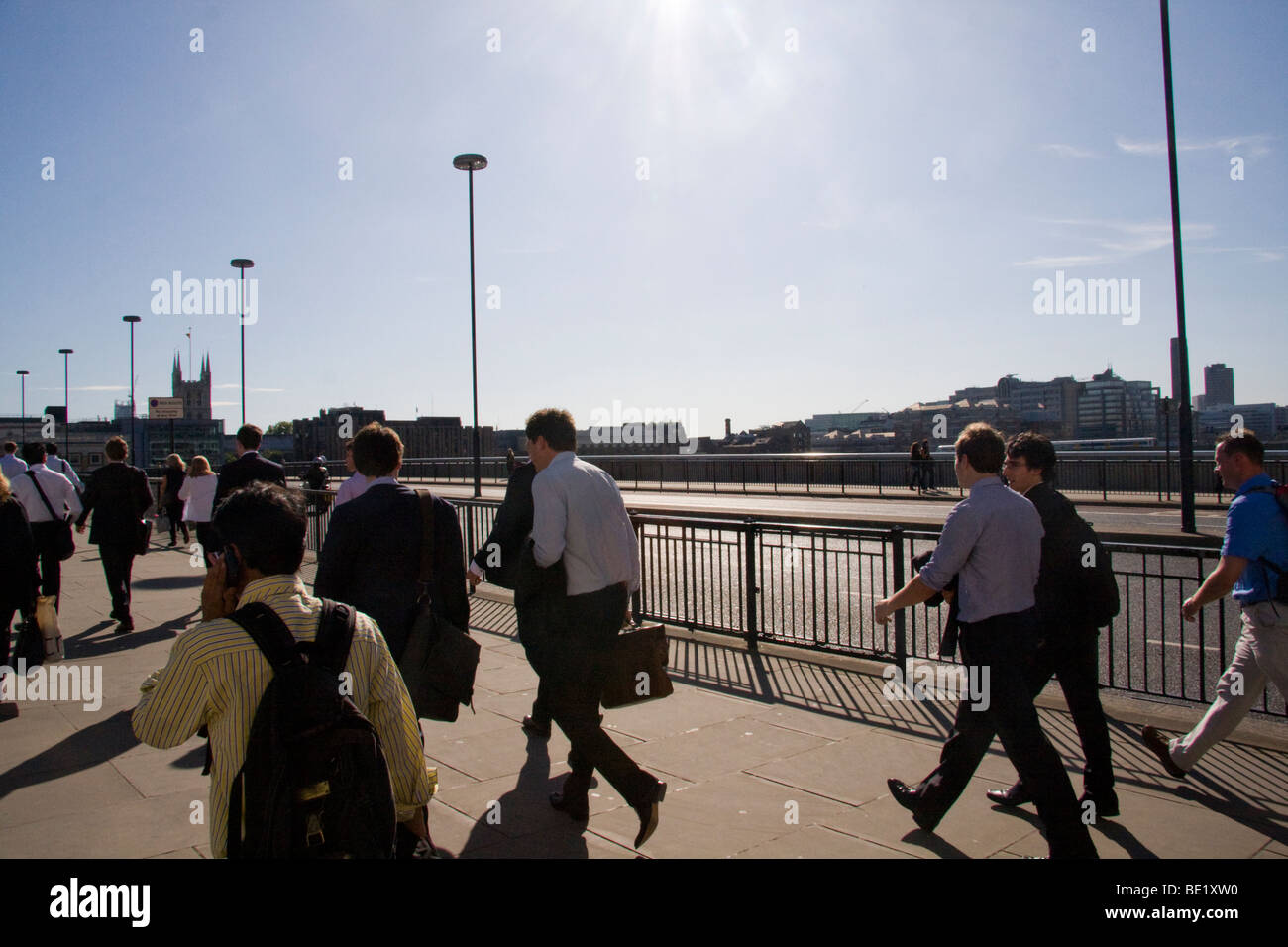 Commuters crossing London Bridge London England Stock Photo - Alamy