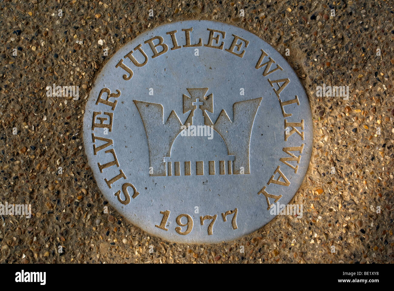 Metal plaque embedded in the pavement to mark the Silver Jubilee ...