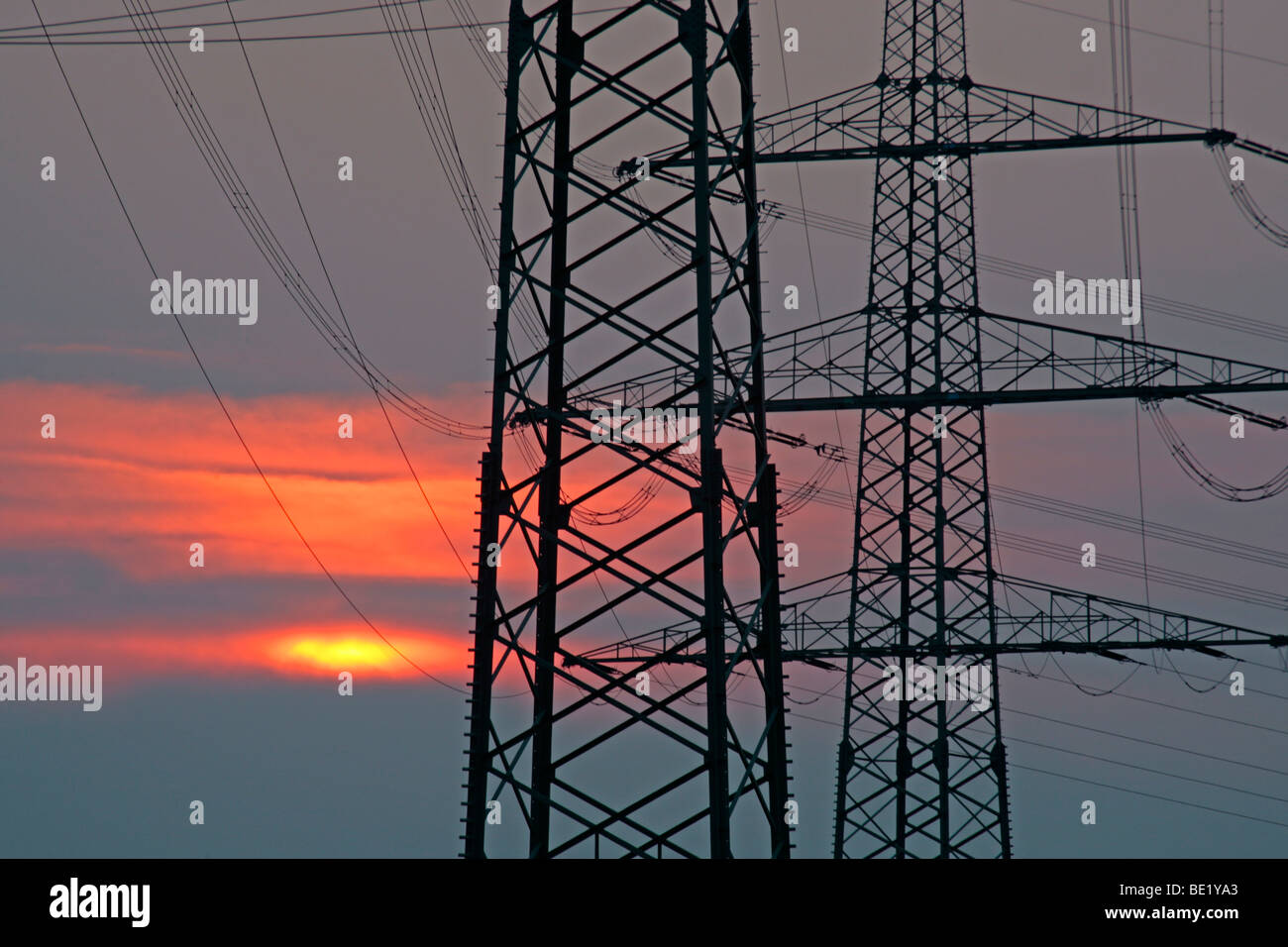 Sunset behind electricity pole hi-res stock photography and images - Alamy