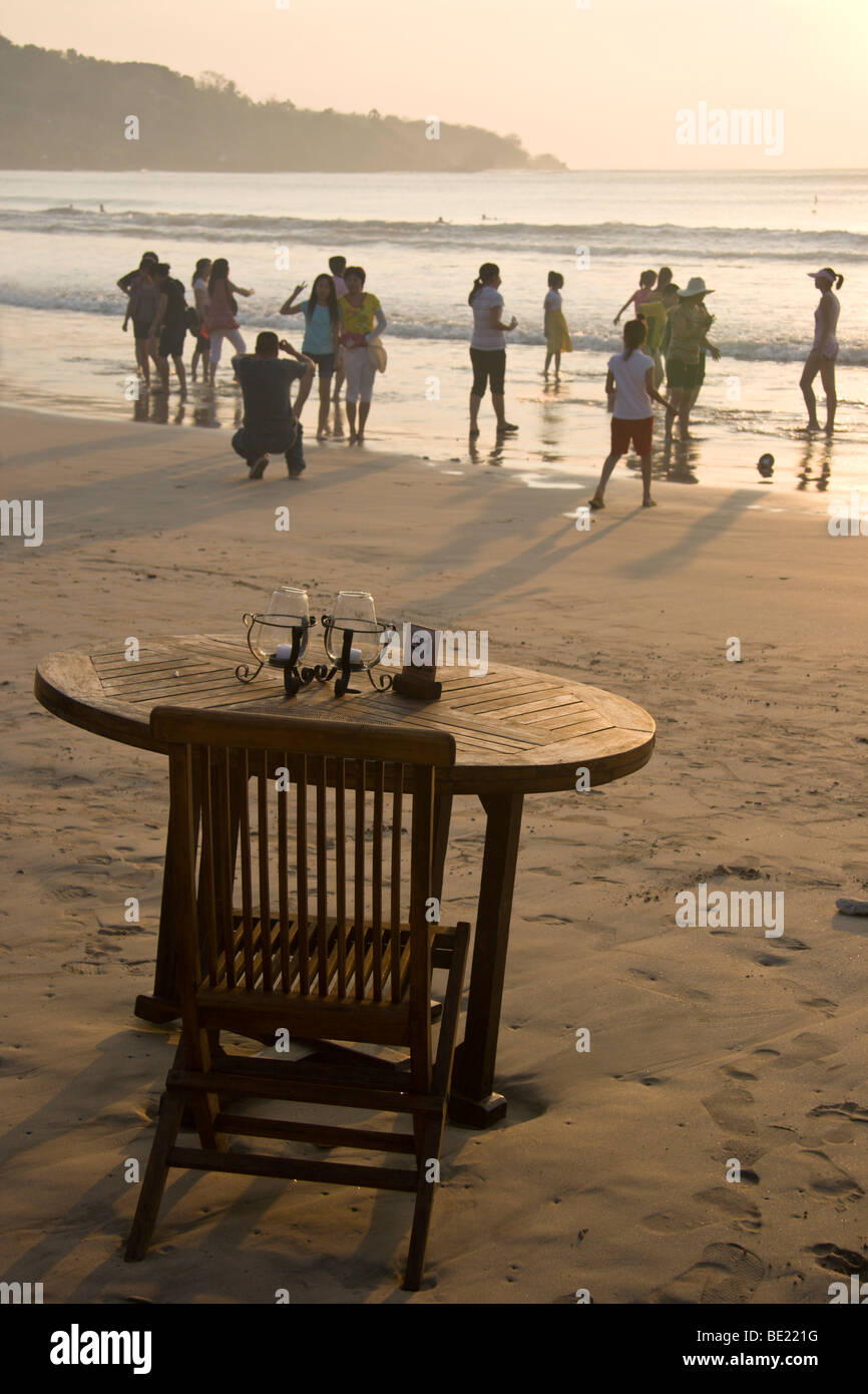 People gathering for sunset at Jimbaran Beach, Bali Stock Photo - Alamy