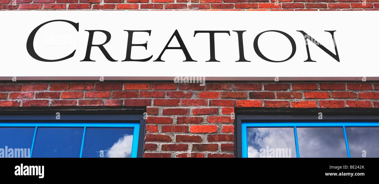 creation sign on building Stock Photo - Alamy