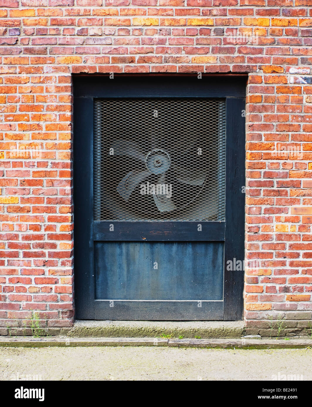 brick wall with recessed ventilation fan Stock Photo - Alamy