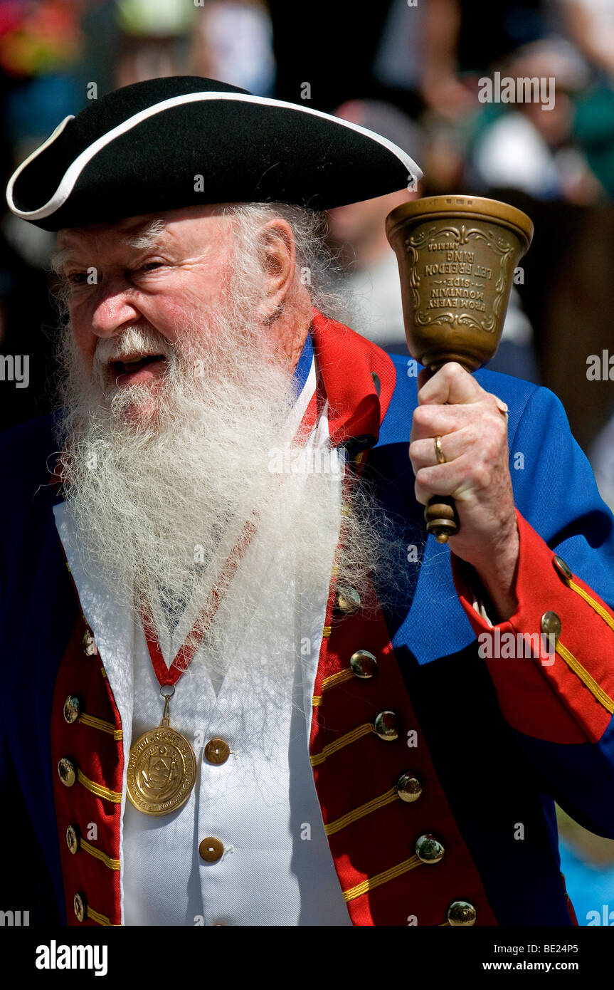 Man dressed in colonial costume as Town Crier leading Fourth of July ...