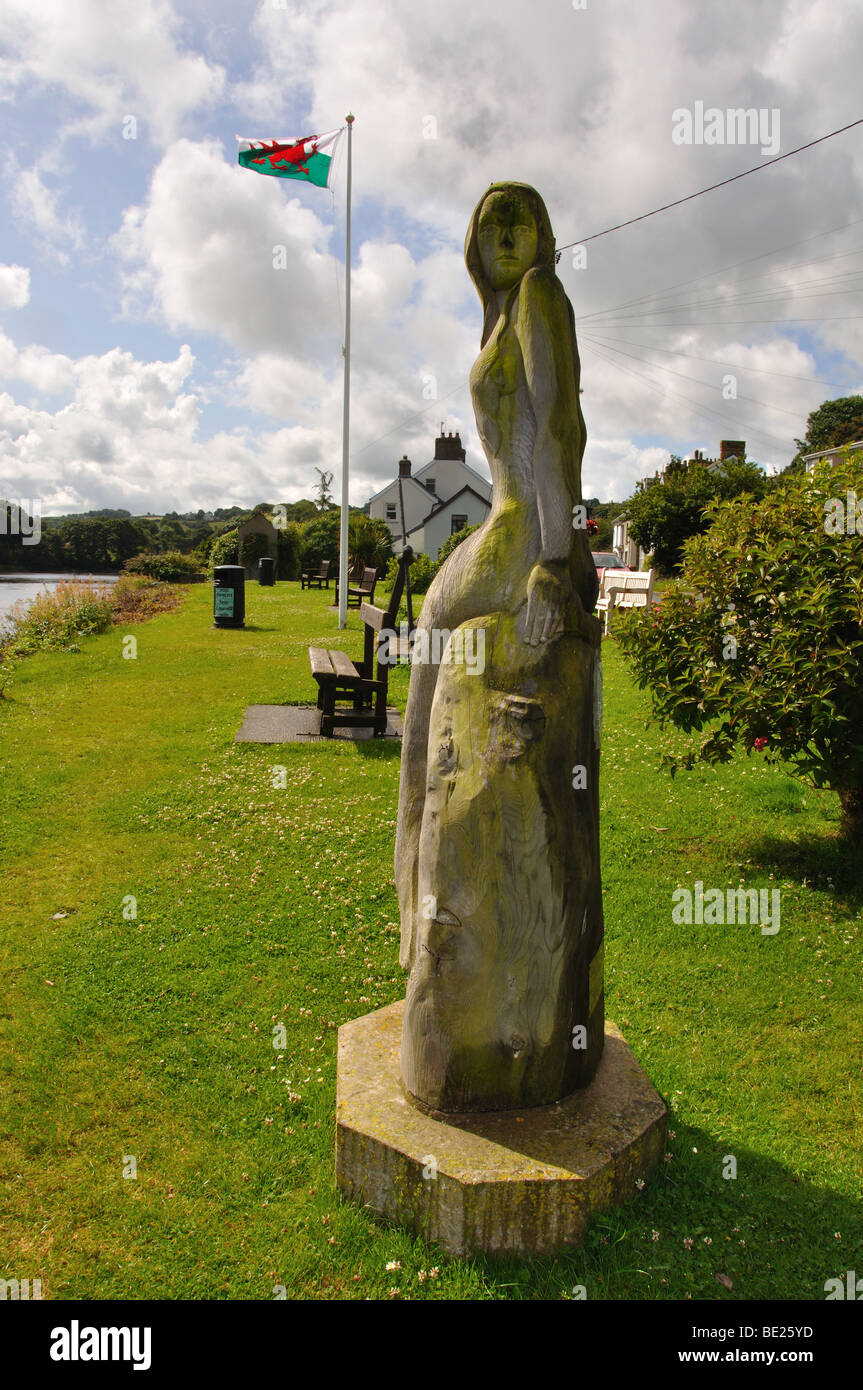 Mermaid statue and Welsh flag, The Mooring, St Dogmaels Stock Photo - Alamy
