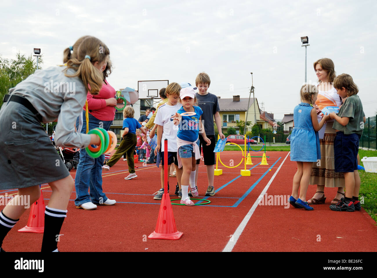The girl throws the ring Stock Photo - Alamy