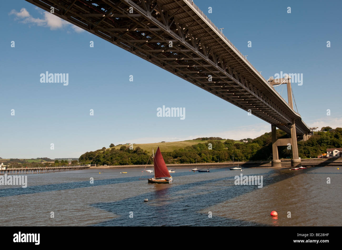 On the Devon and Cornwall border a sailing boat passes under The Royal ...