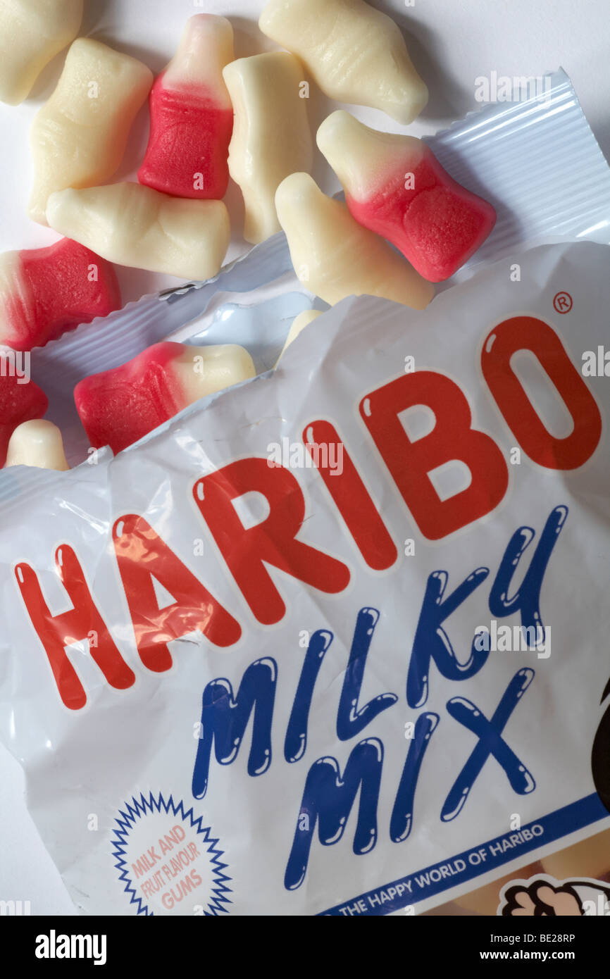 haribo milky mix milk bottle sweets packet open with contents spilled ...