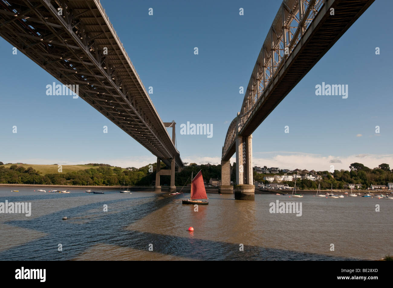 On the Devon and Cornwall border a sailing boat passes under The Royal ...