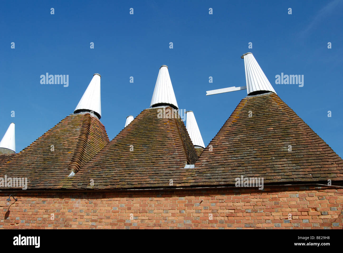Ventilation cowls on Oast Houses in Kent, England Stock Photo - Alamy