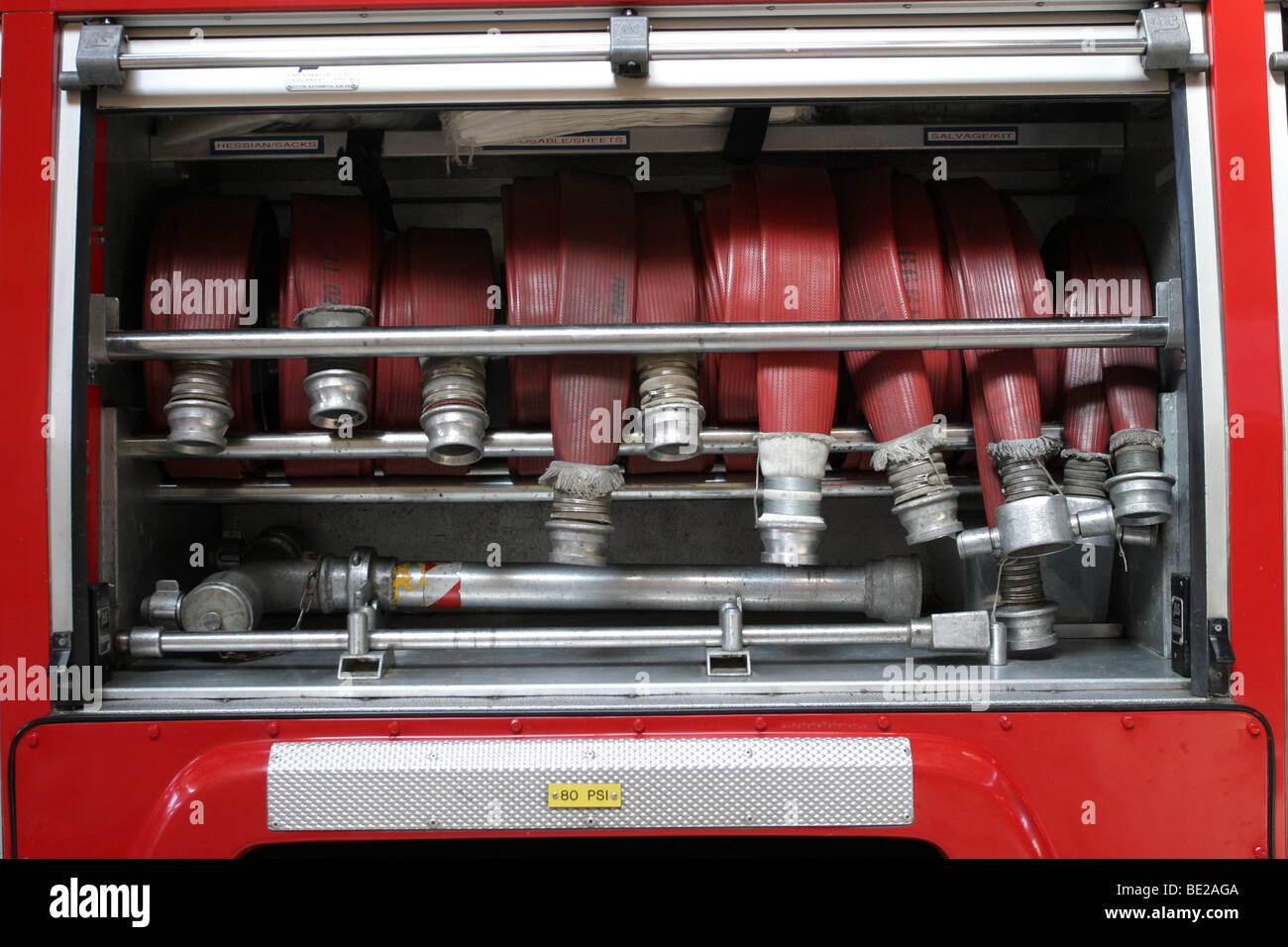 Hoses inside a fire engine Stock Photo - Alamy