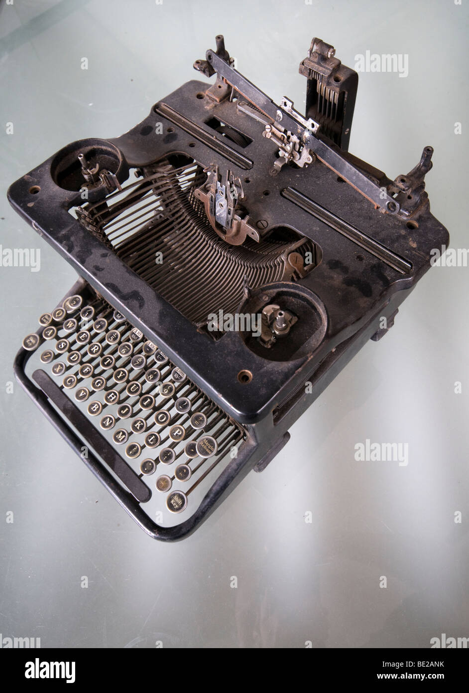 Old fashioned mechanical office typewriter on a plain background Stock ...