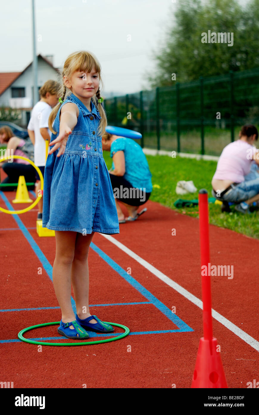 The girl throws the ring Stock Photo - Alamy